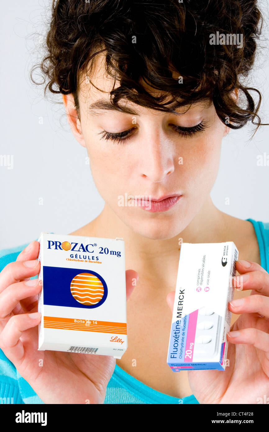 WOMAN TAKING GENERIC DRUG Stock Photo - Alamy