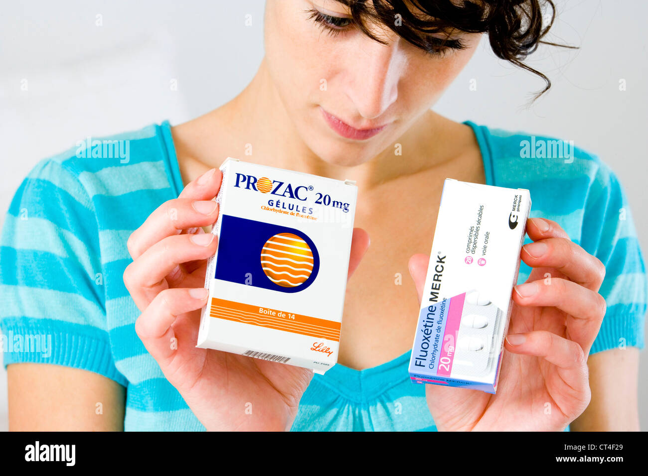 WOMAN TAKING GENERIC DRUG Stock Photo - Alamy