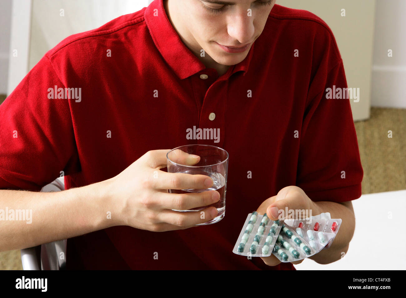 MAN TAKING MEDICATION Stock Photo - Alamy