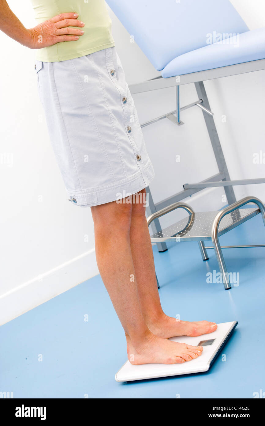 Female patient being weighed female hi-res stock photography and images ...