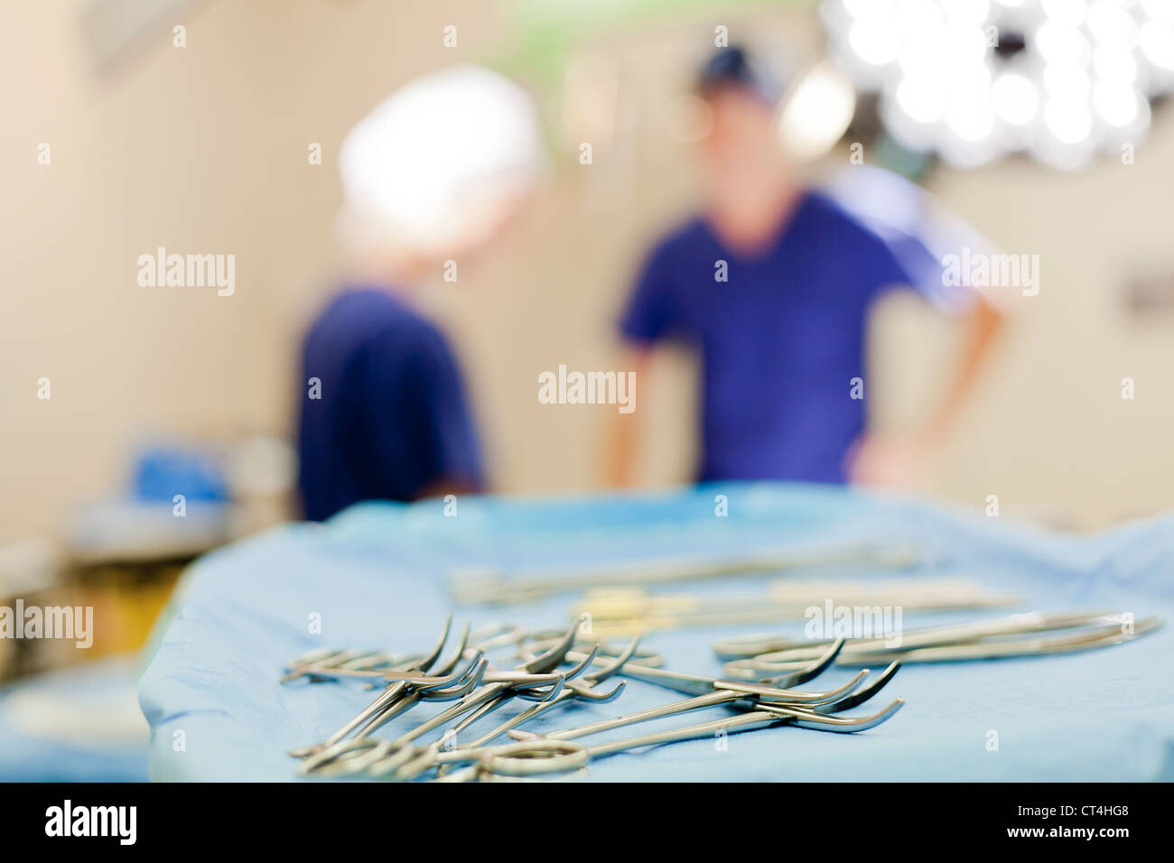 Surgeon and nurse in operating theatre Stock Photo - Alamy