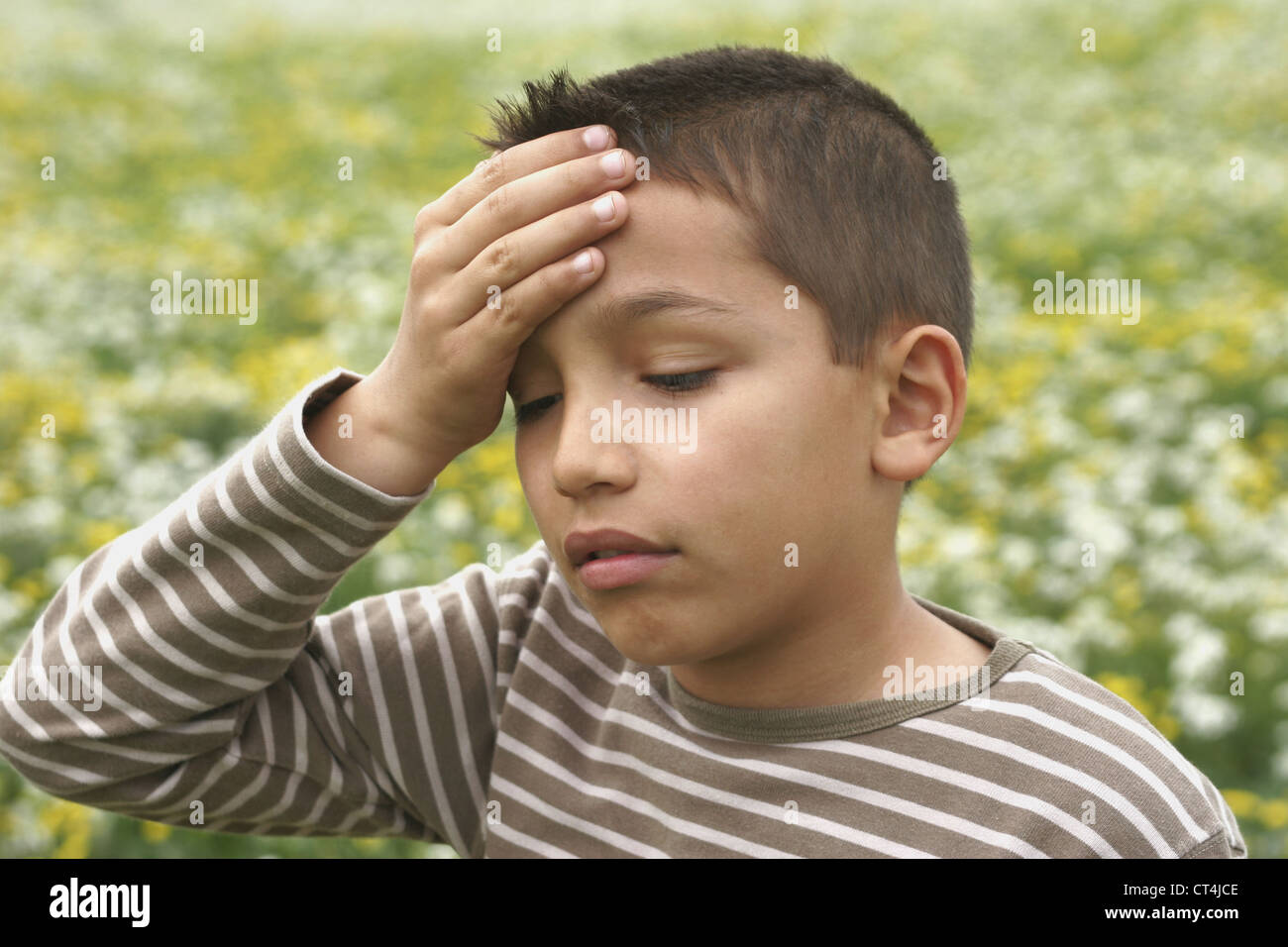 CHILD WITH HEADACHE Stock Photo - Alamy