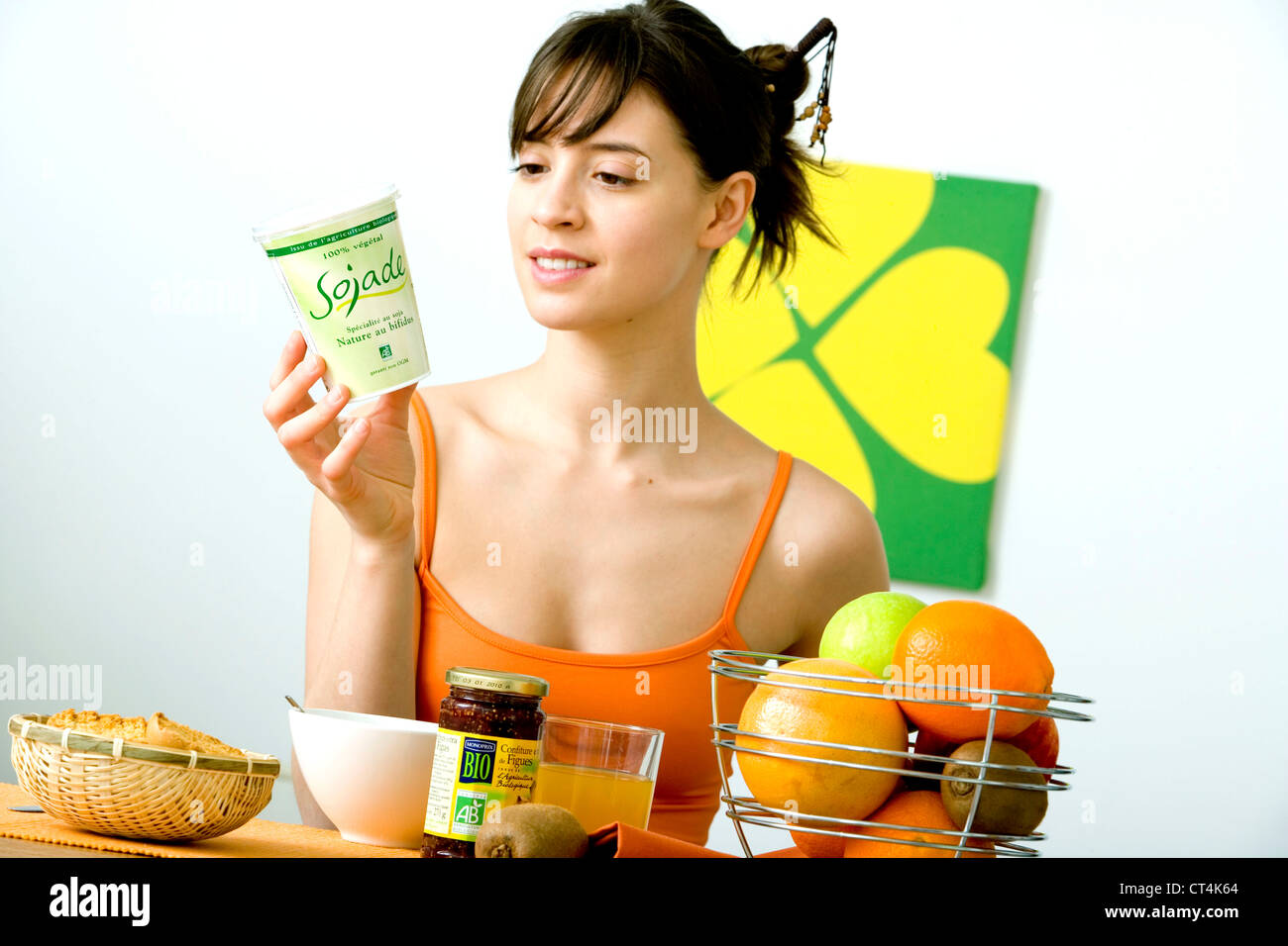 WOMAN EATING BREAKFAST Stock Photo - Alamy