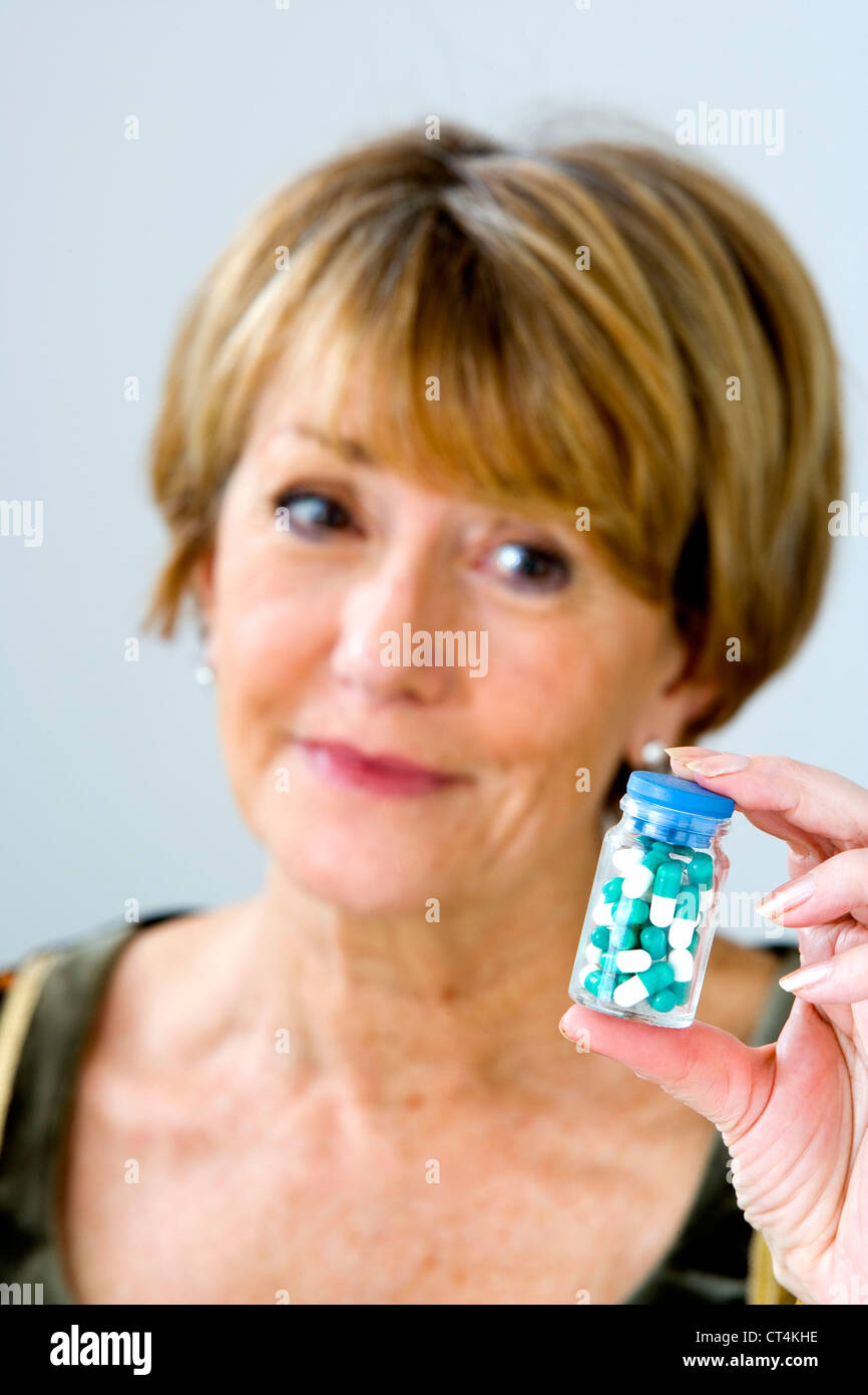 ELDERLY PERSON TAKING MEDICATION Stock Photo - Alamy