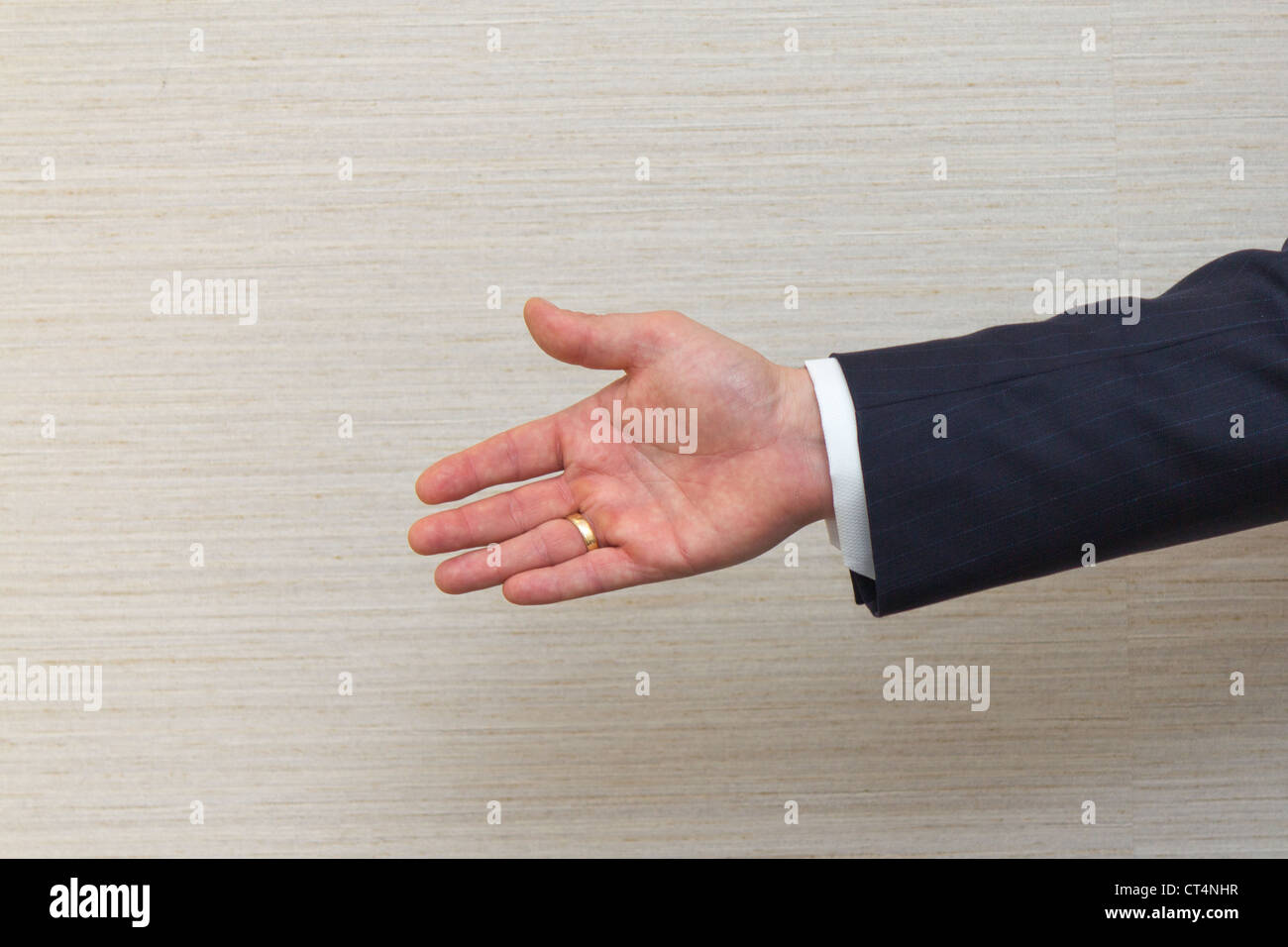 Business man offering a handshake Stock Photo - Alamy