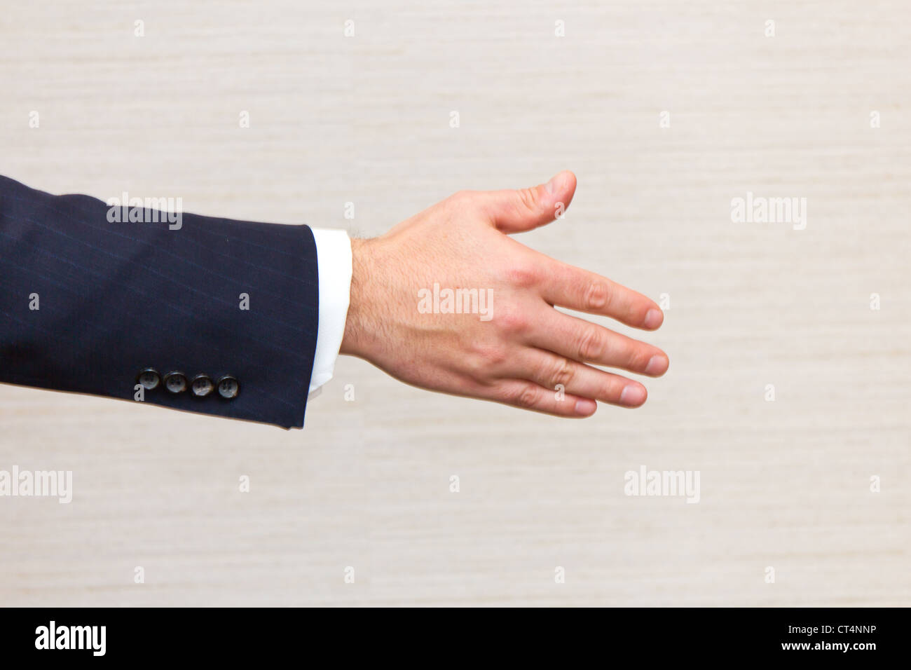 Business man offering a handshake Stock Photo - Alamy