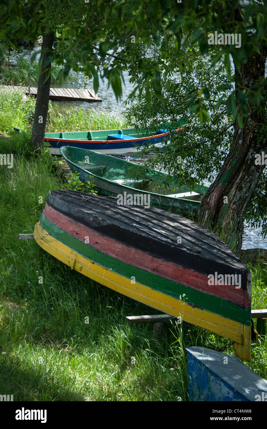A boat painted like the Lithuanian flag at lake Galve in Trakai ...