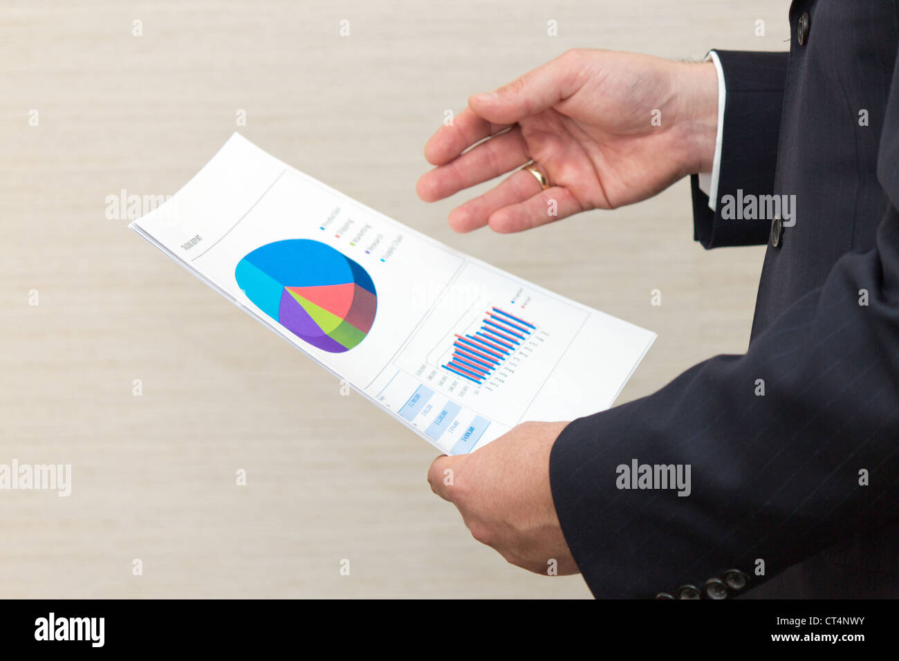 Business man reading a document Stock Photo - Alamy