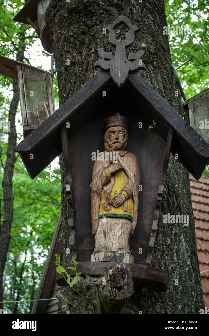 The Pensive Christ on a tree in Western Lithuania Stock Photo - Alamy