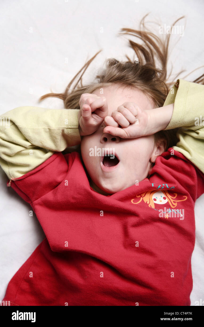 Child laying awake in bed hi-res stock photography and images - Alamy