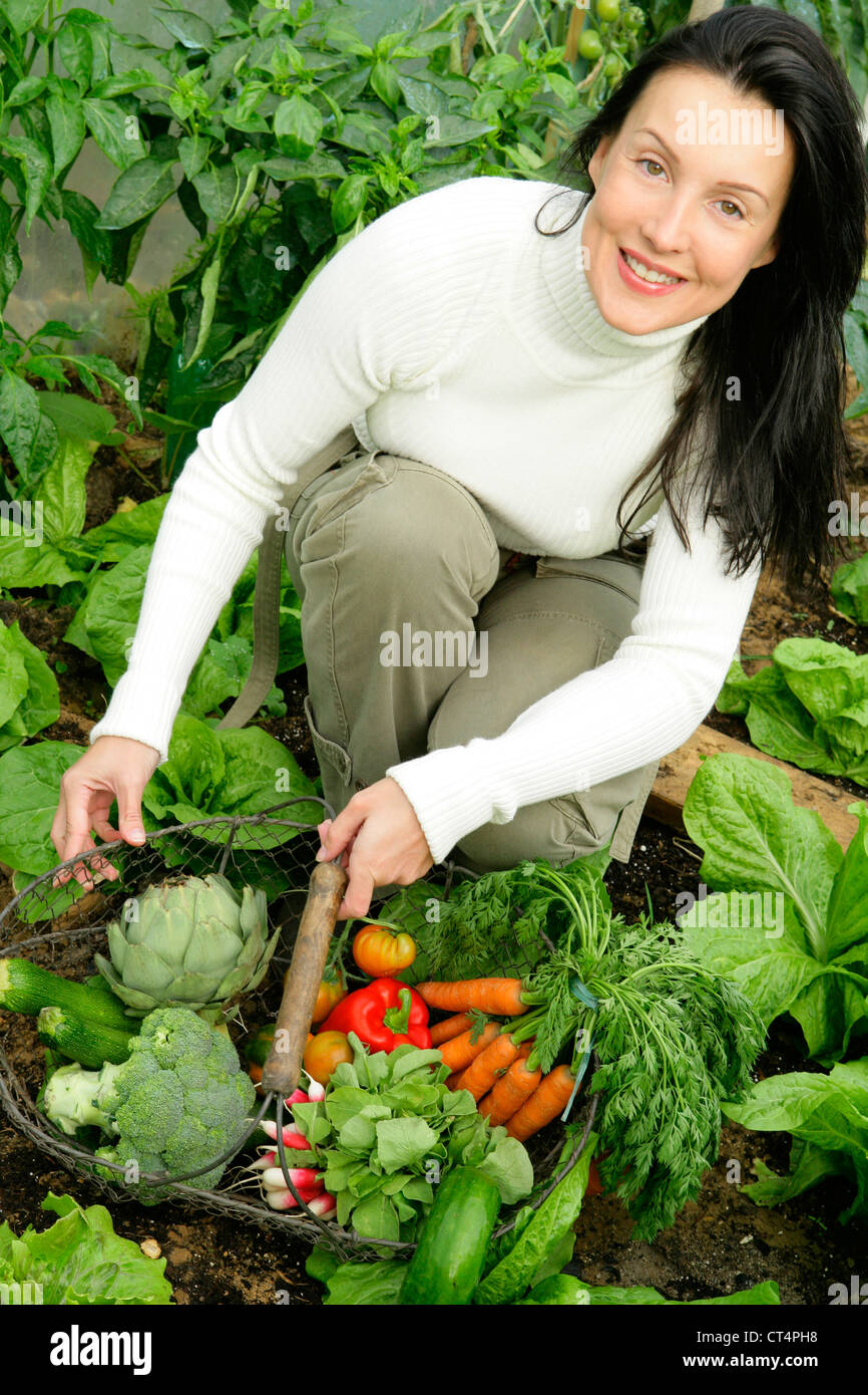 Greenhouse garden woman 40 hi-res stock photography and images - Alamy