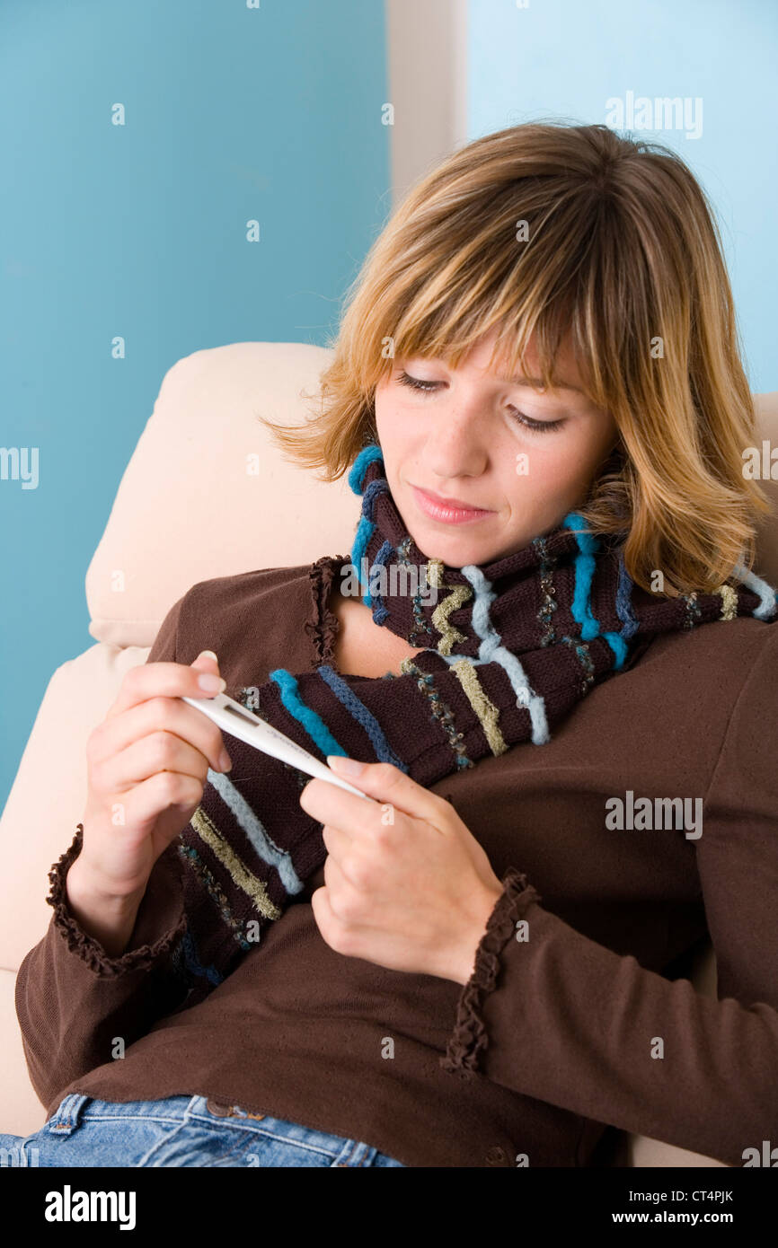 WOMAN WITH FEVER Stock Photo - Alamy