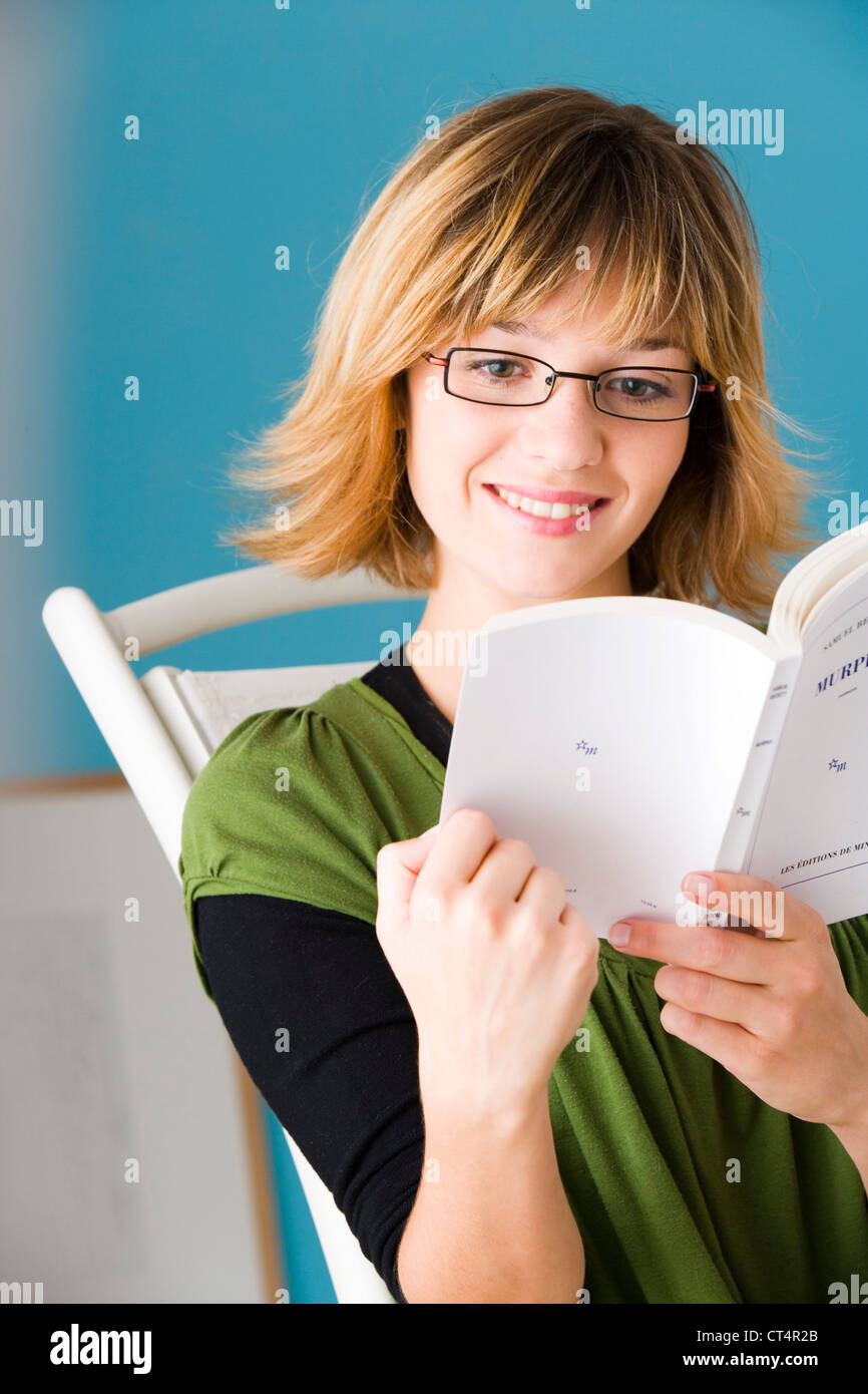 Old woman reading book taking hi-res stock photography and images - Alamy