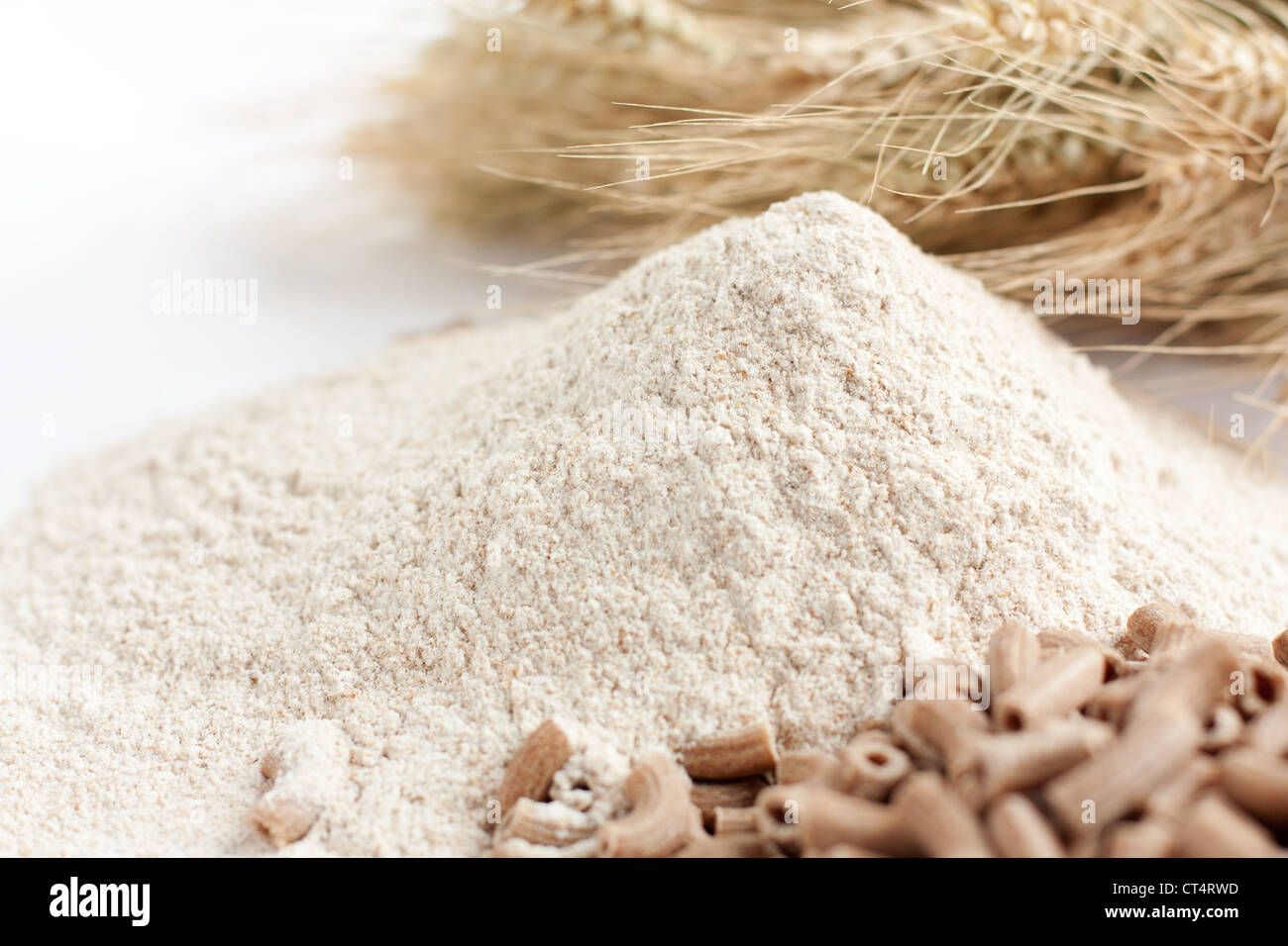Flour with bran a close-up and ears of wheat Stock Photo - Alamy
