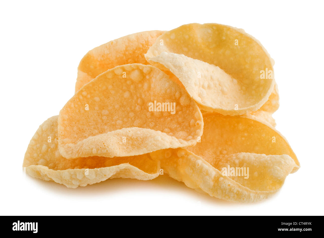 A pile of poppadums isolated on a white background Stock Photo - Alamy