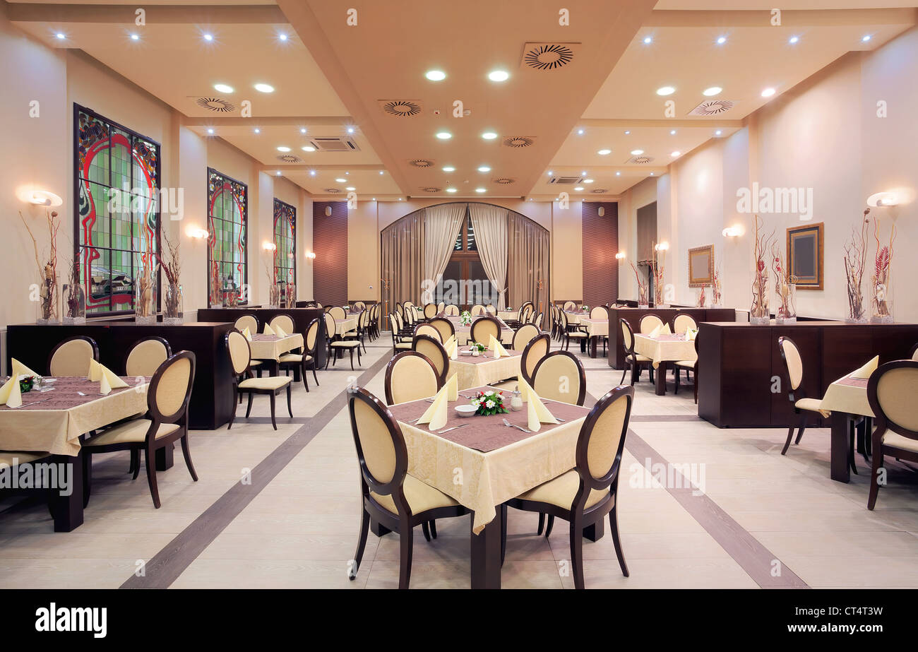 Interior of a restaurant in a hotel, during evening Stock Photo - Alamy