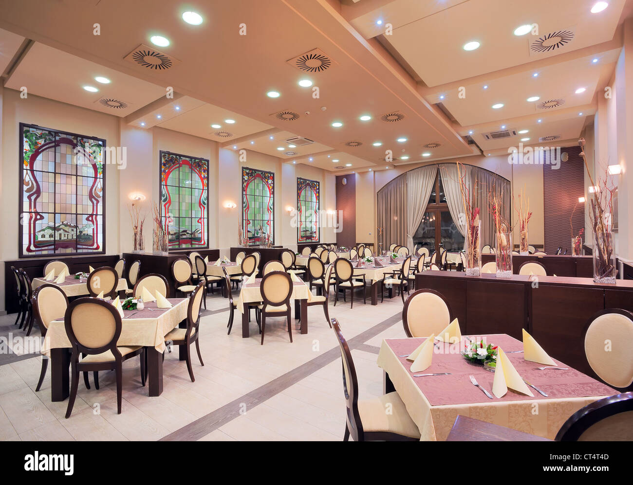 Interior of a restaurant in a hotel, during evening Stock Photo - Alamy