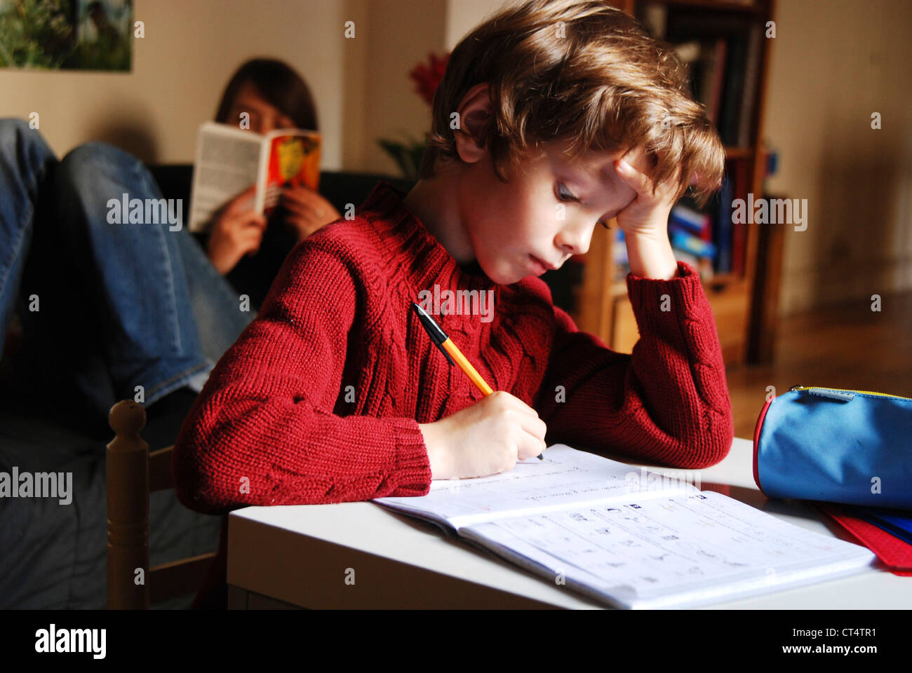 CHILD DOING HOMEWORK Stock Photo - Alamy