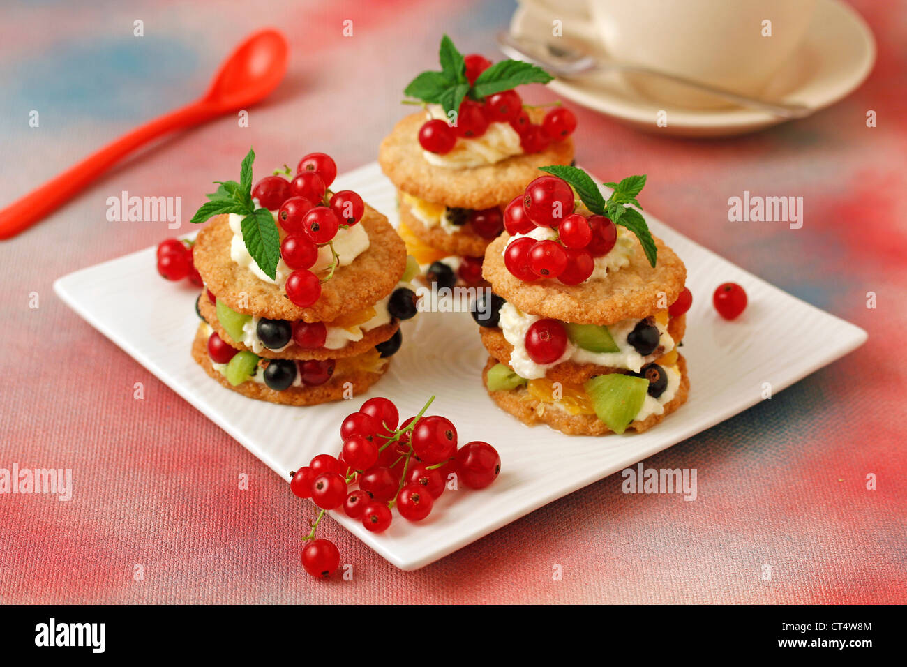 Cookies tower with cheese and fruits. Recipe available Stock Photo - Alamy