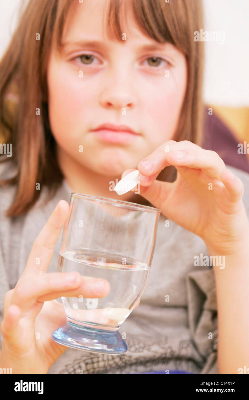CHILD TAKING MEDICATION Stock Photo - Alamy