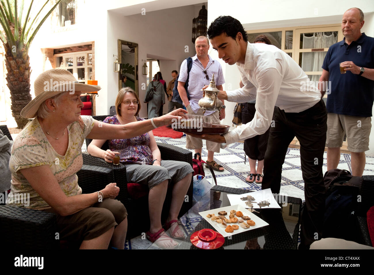 Hotel lobby guests hi-res stock photography and images - Alamy
