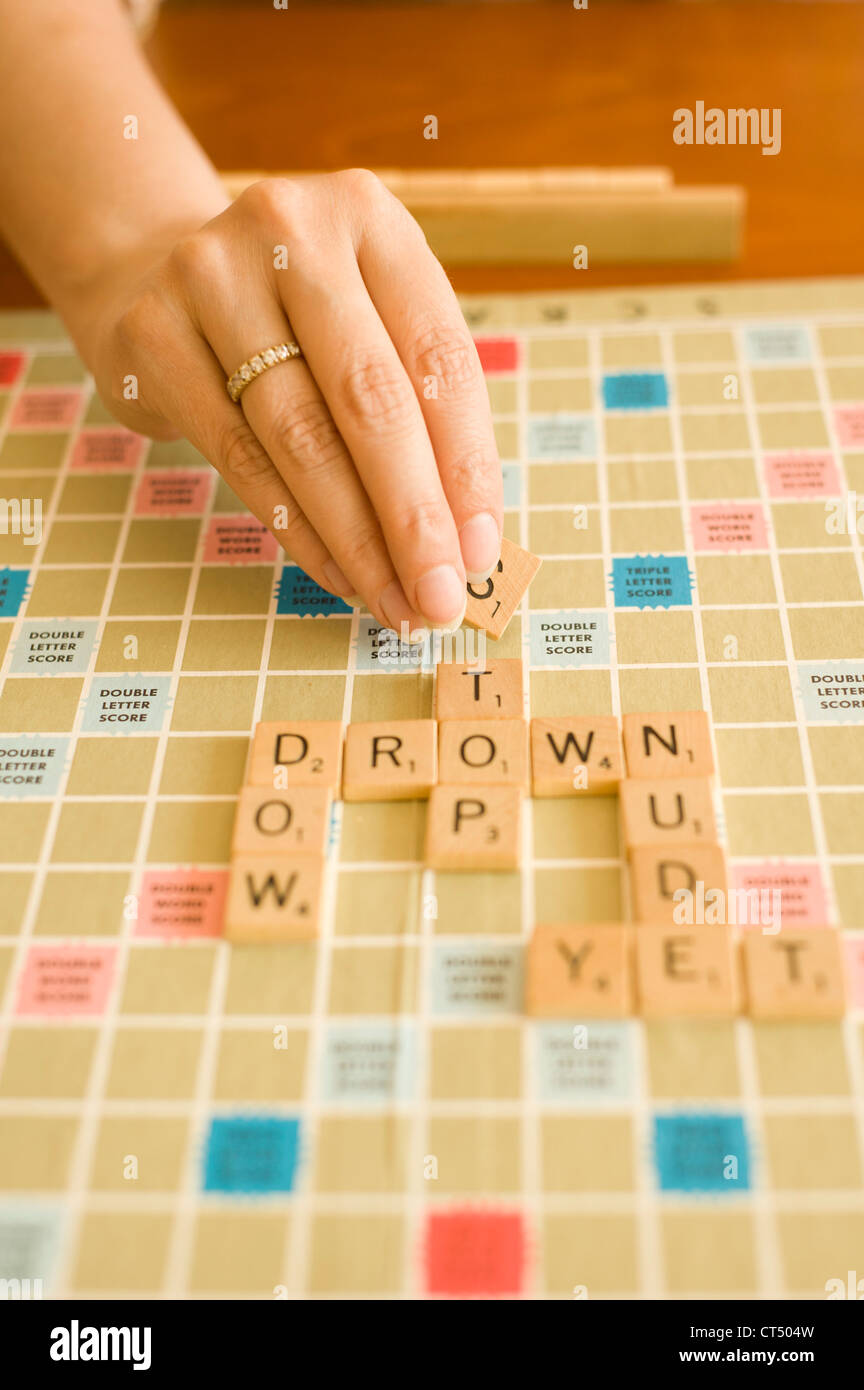 woman playing scrabble Stock Photo - Alamy