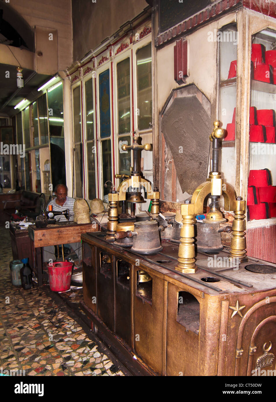 Traditional Fez maker in shop in Khan el Khalili Cairo Stock Photo - Alamy