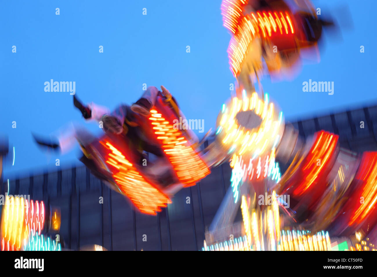 Rotating colorful carousel hi-res stock photography and images - Alamy