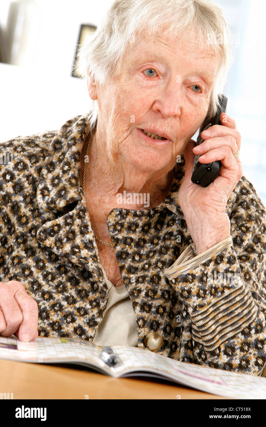 ELDERLY PERSON ON THE PHONE Stock Photo - Alamy