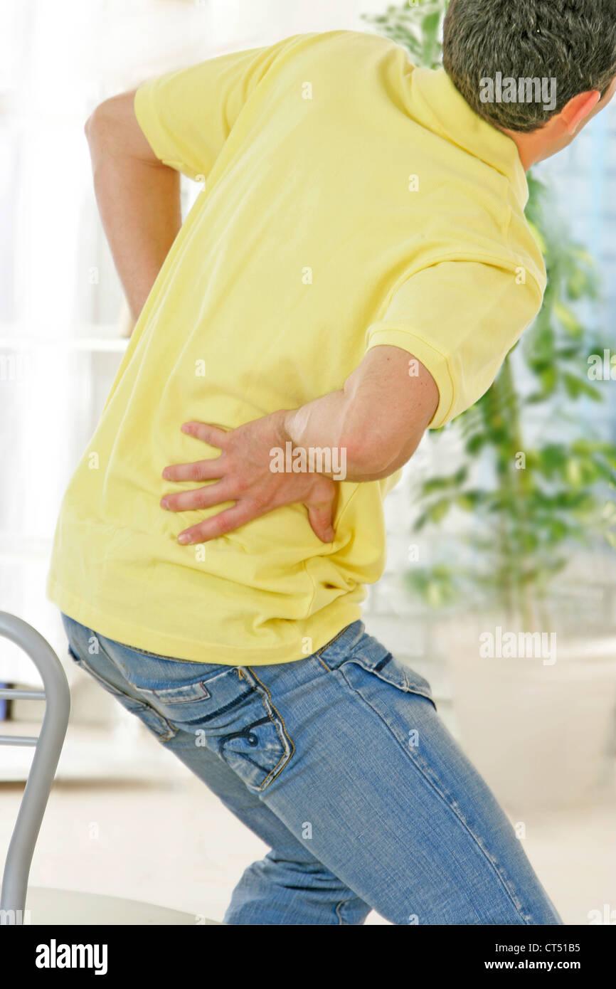 LOWER BACK PAIN IN A MAN Stock Photo - Alamy
