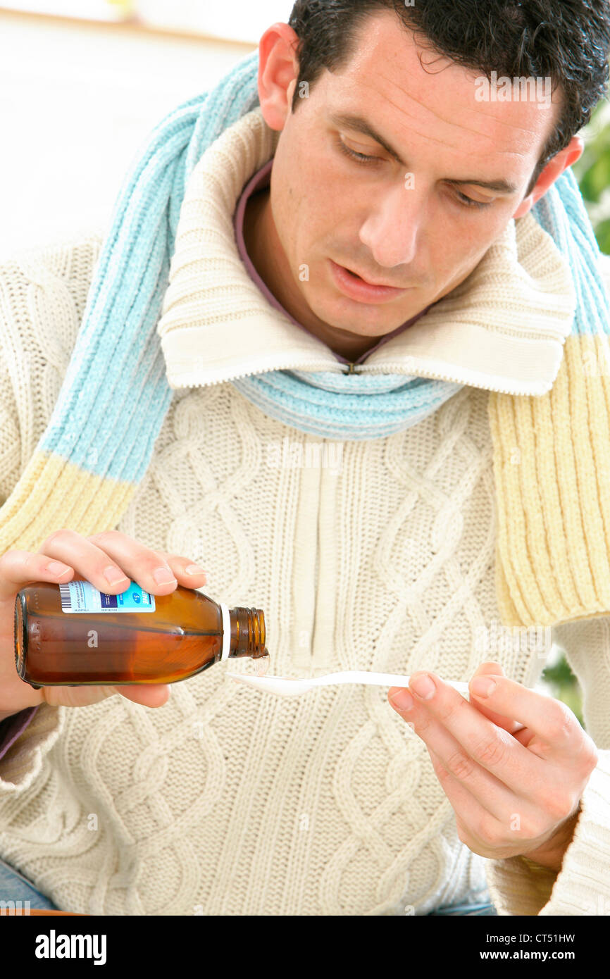 COUGHING TREATMENT MAN Stock Photo - Alamy