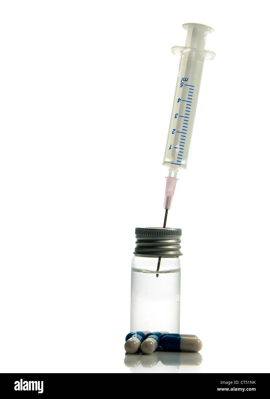 medical needle in bottle with liquid isolated on white Stock Photo - Alamy