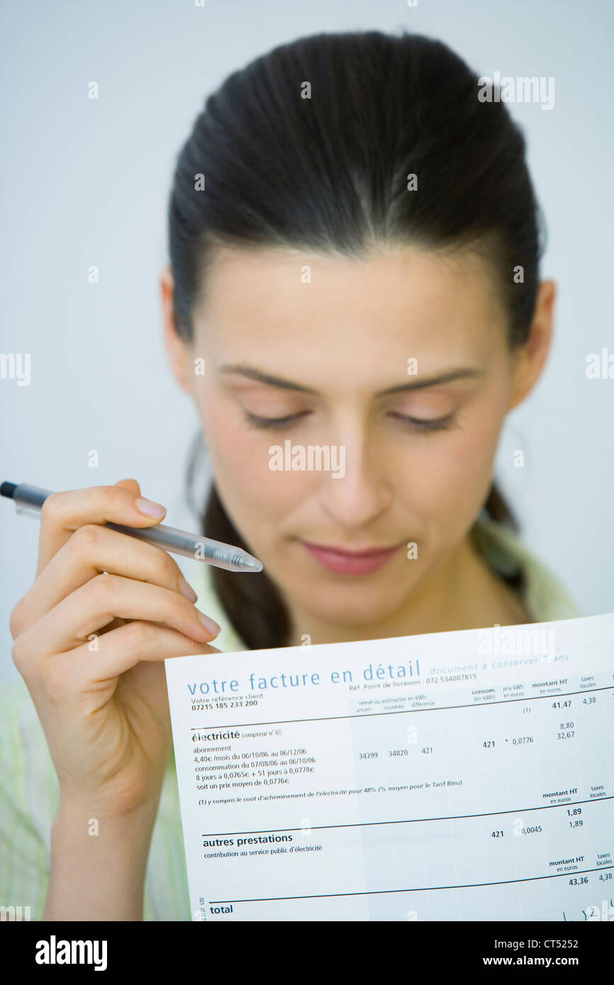 WOMAN DOING PAPERWORK Stock Photo - Alamy