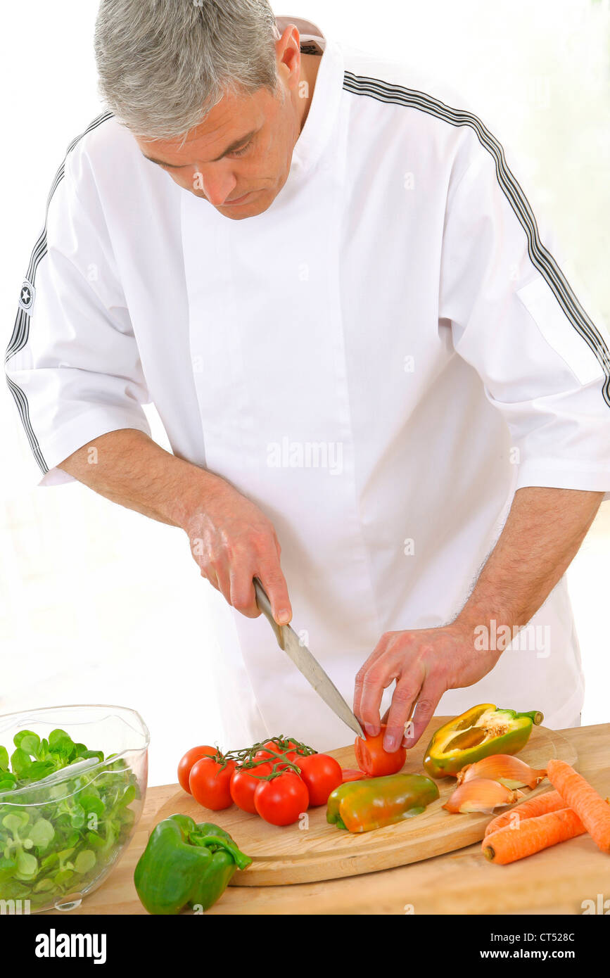 ELDERLY PERSON IN KITCHEN Stock Photo - Alamy