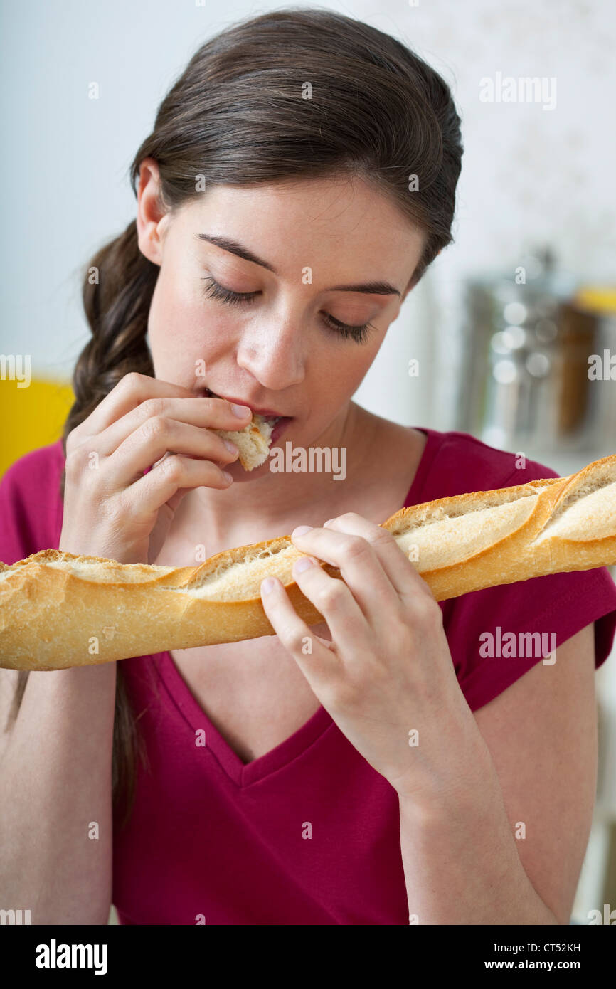 WOMAN EATING STARCHY FOOD Stock Photo - Alamy