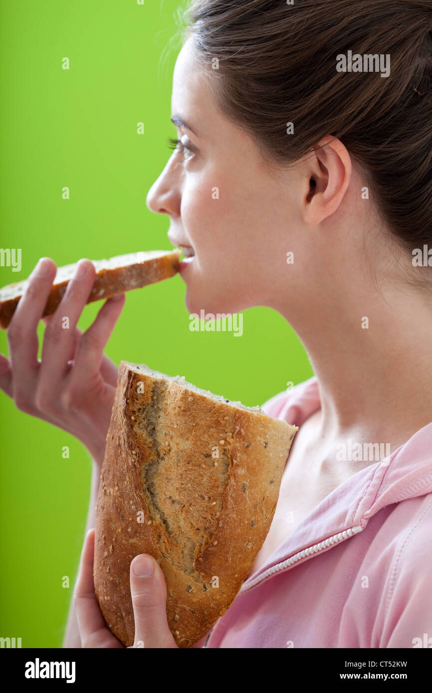 WOMAN EATING STARCHY FOOD Stock Photo - Alamy