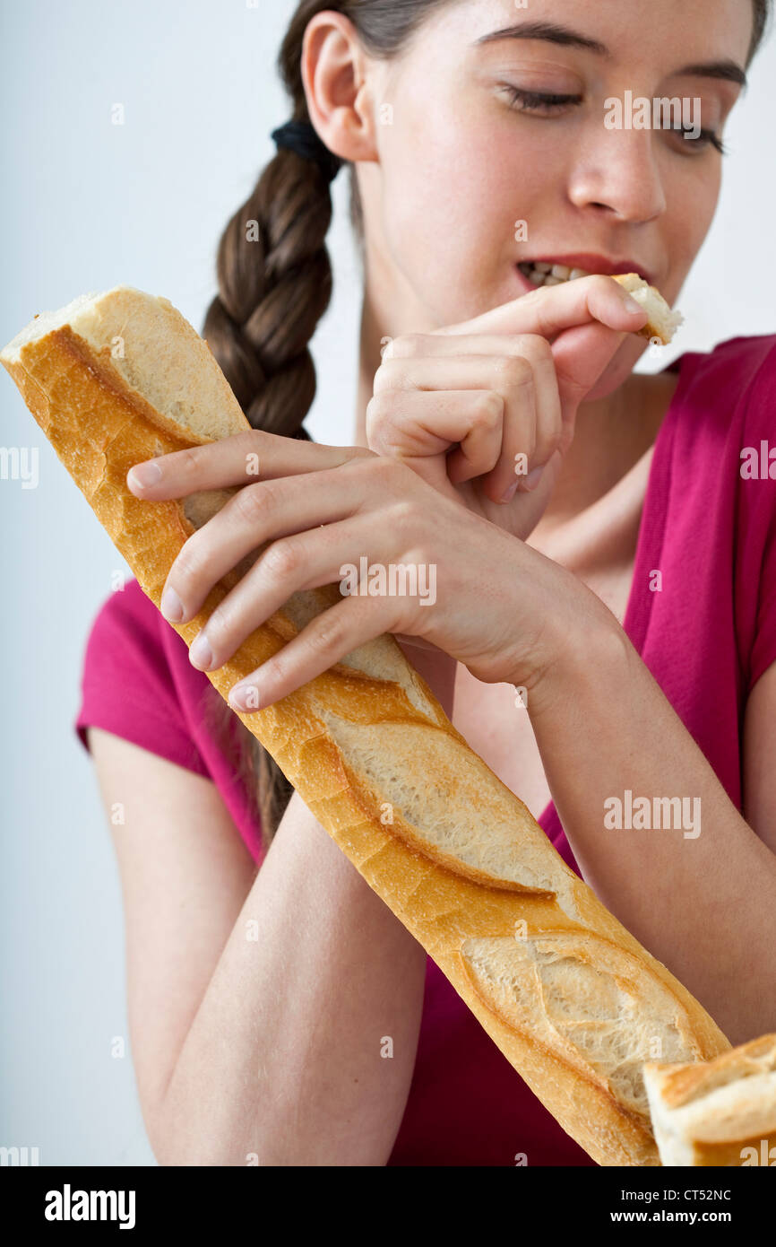 WOMAN EATING STARCHY FOOD Stock Photo - Alamy