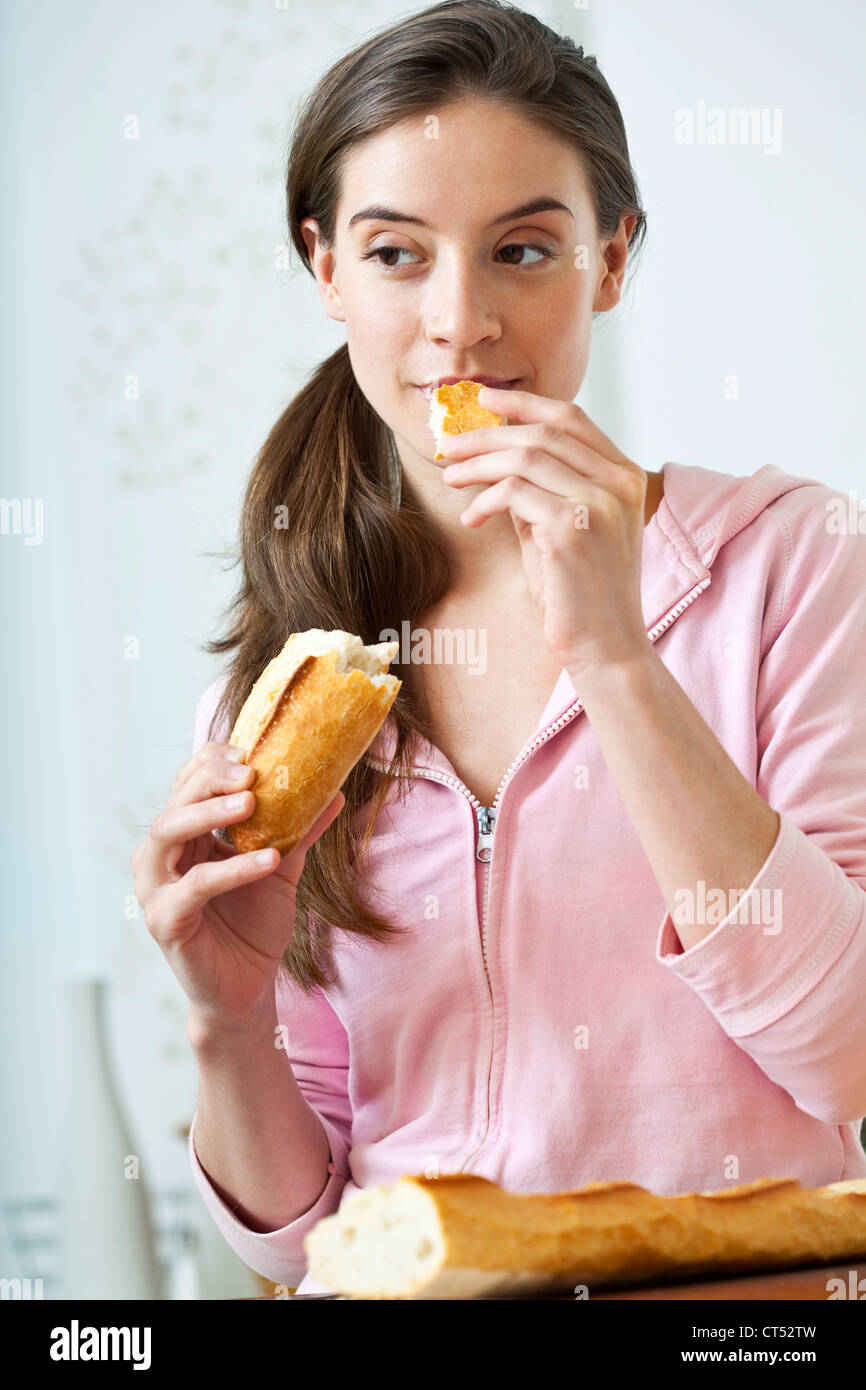 WOMAN EATING STARCHY FOOD Stock Photo - Alamy