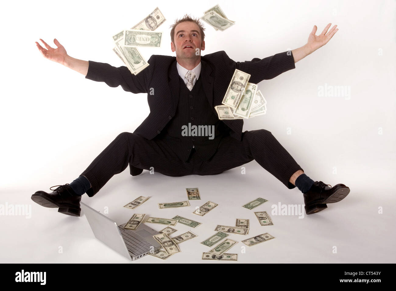 Throwing money in the air businessman hi-res stock photography and ...