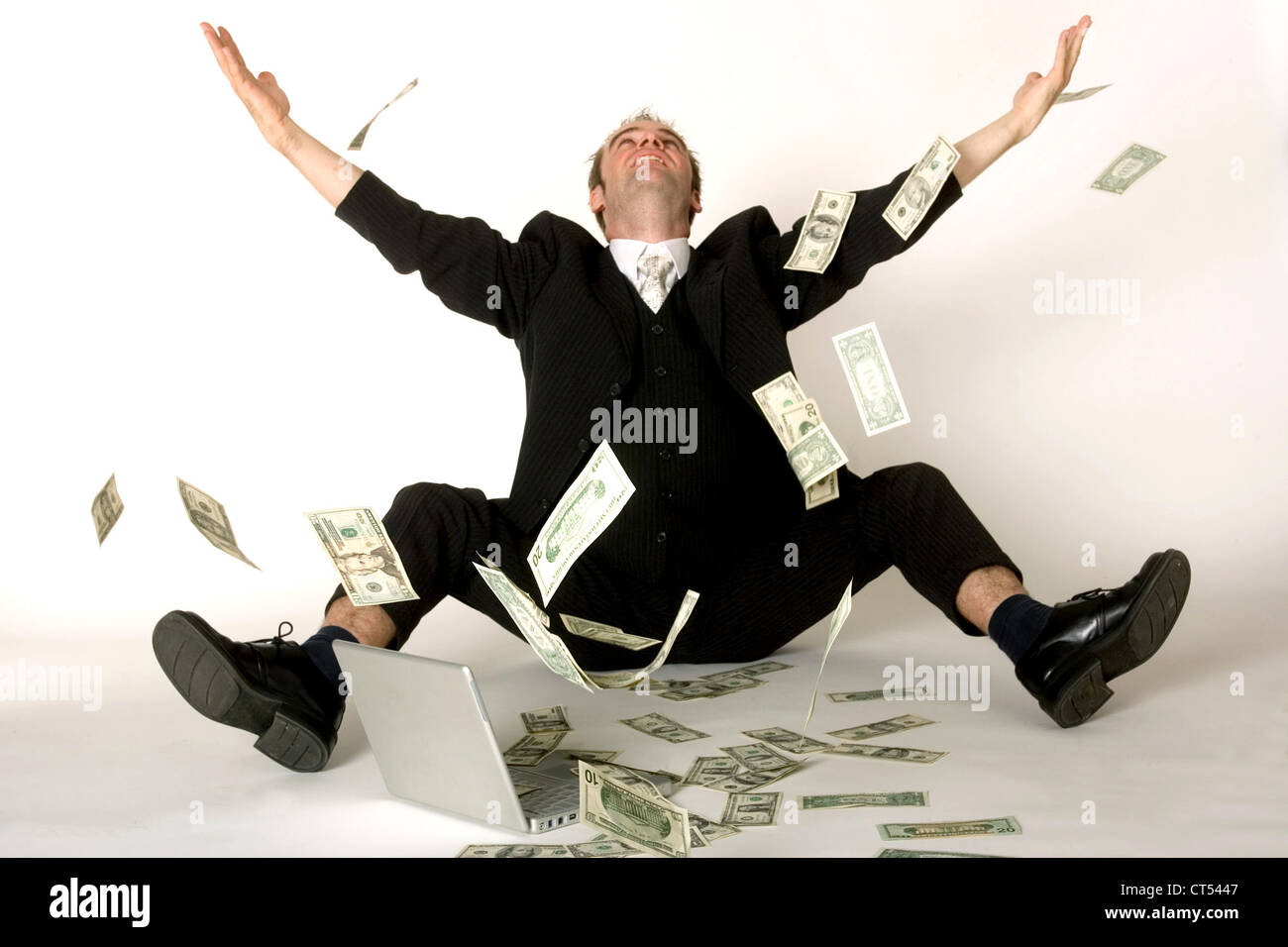 Throwing money in the air businessman hi-res stock photography and ...