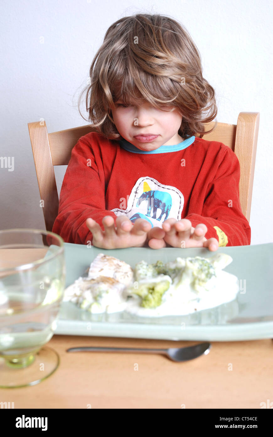 CHILD EATING A MEAL Stock Photo - Alamy