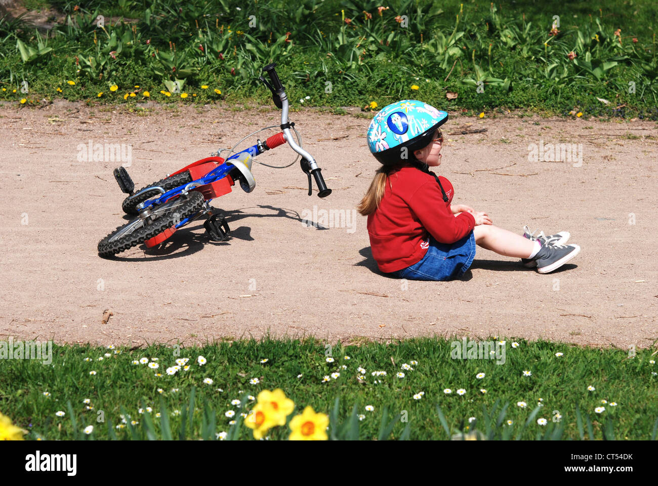 Child falling bicycle hi-res stock photography and images - Alamy