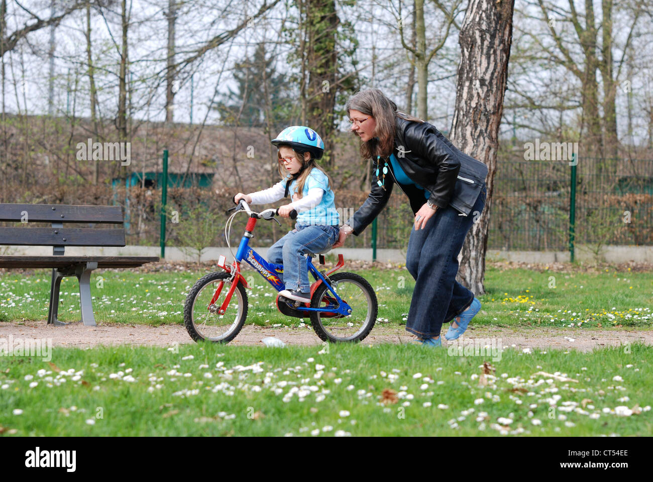 Woman shielding child hi-res stock photography and images - Alamy