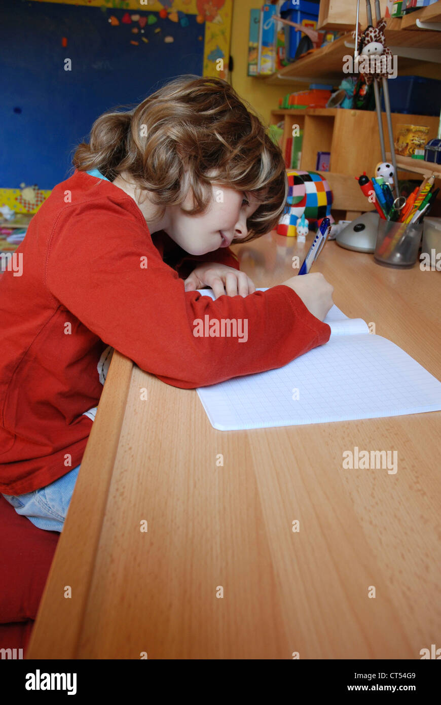 CHILD DOING HOMEWORK Stock Photo - Alamy