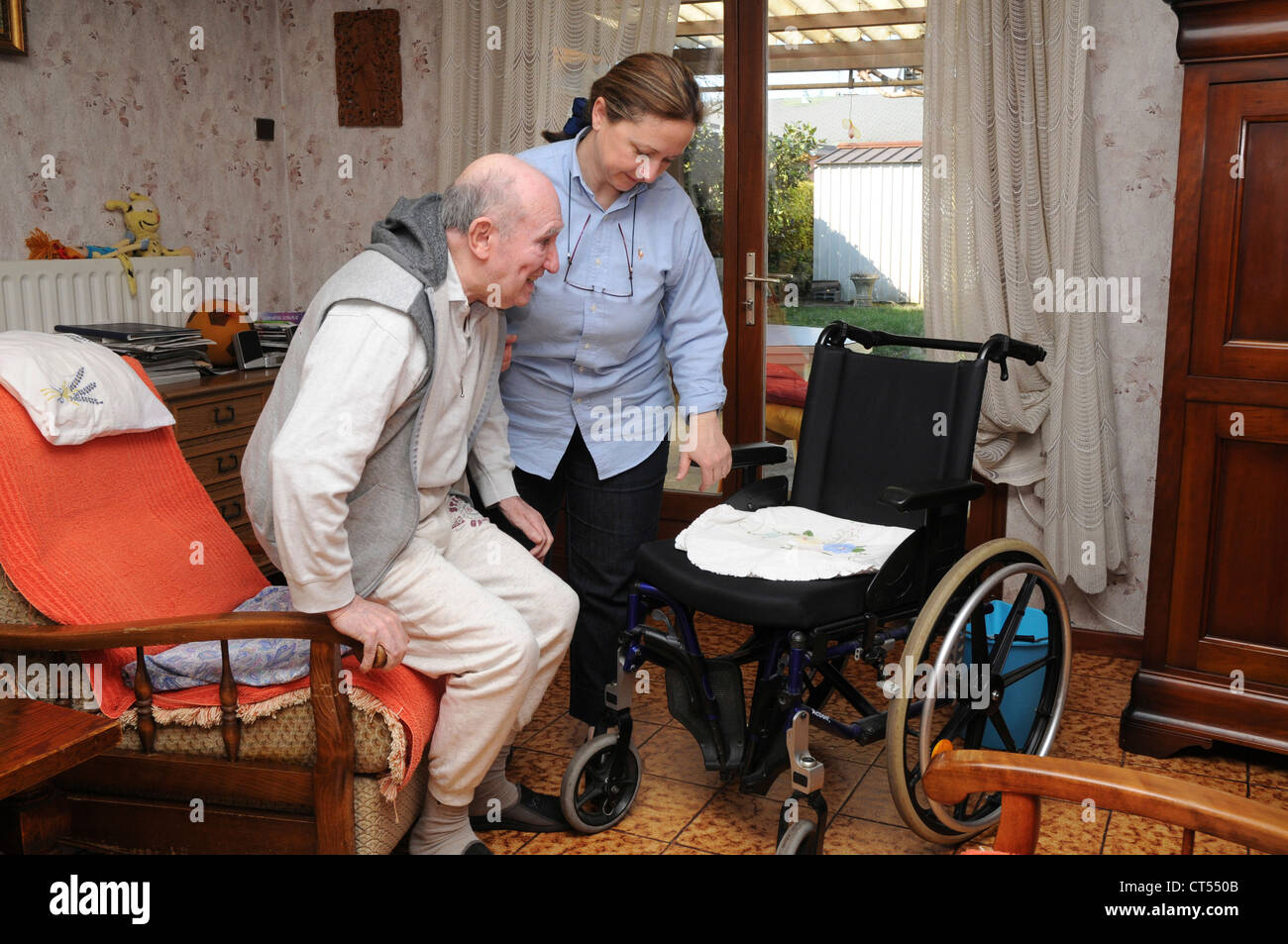 Elderly infirm nurse hi-res stock photography and images - Alamy