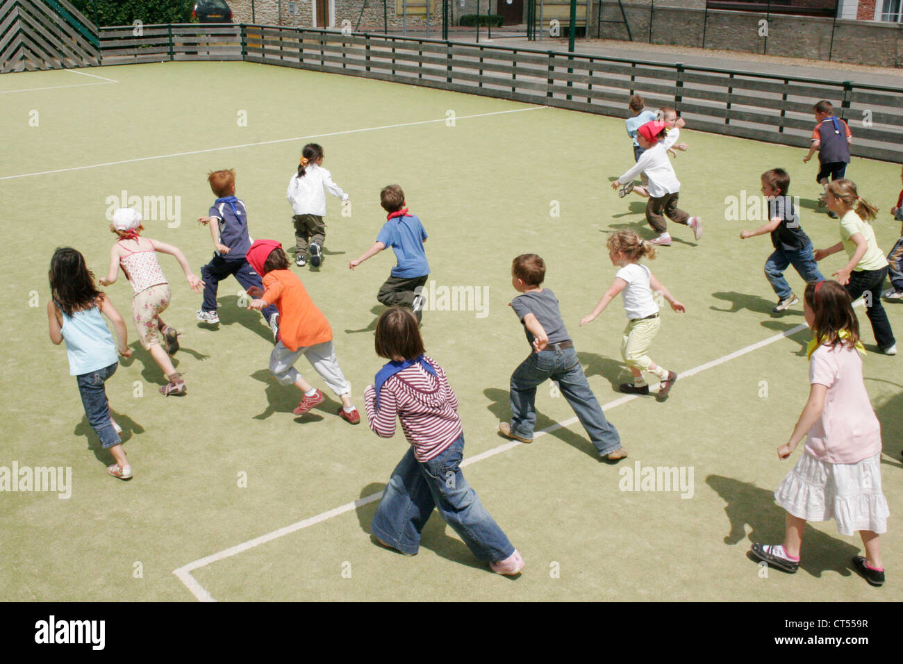 CHILD PLAYING A SPORT Stock Photo - Alamy