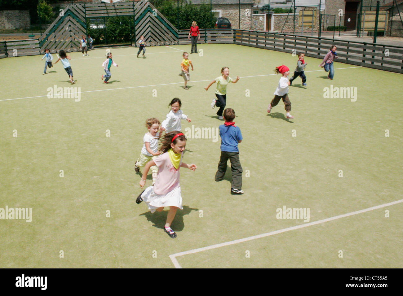 CHILD PLAYING A SPORT Stock Photo - Alamy