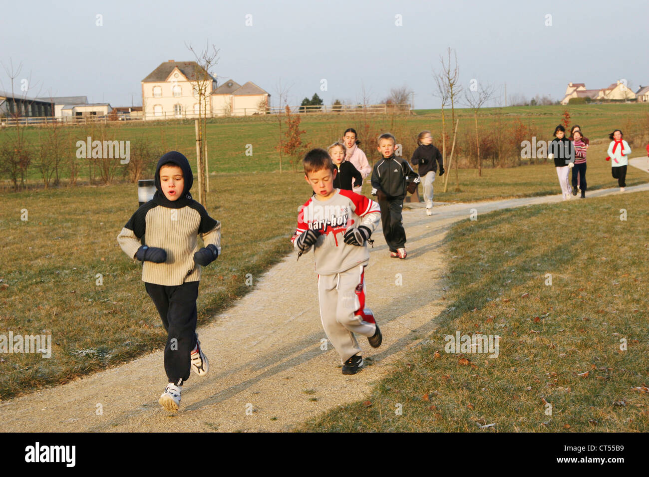 CHILD PLAYING A SPORT Stock Photo - Alamy