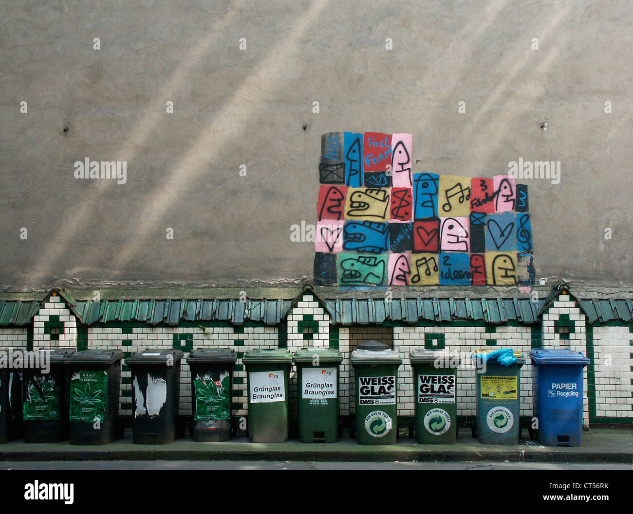 Berlin, graffiti and garbage cans in the backyard Stock Photo - Alamy