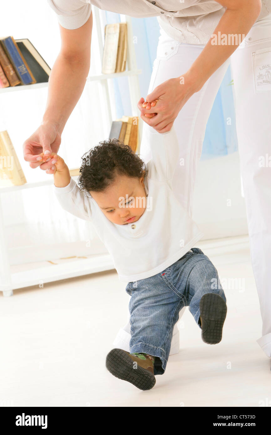 Infant boy walking balancing hi-res stock photography and images - Alamy
